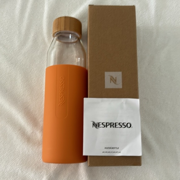 Nespresso | Kitchen | Nespresso Orange Glass Water Bottle | Poshmark